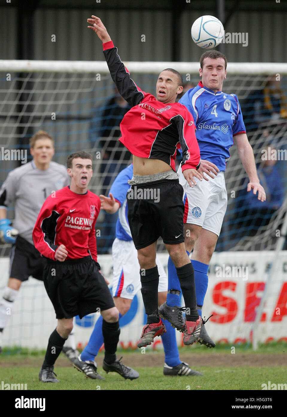 Darren Blewitt and Danny Gabriel in action watched by Ben Boyce and ...