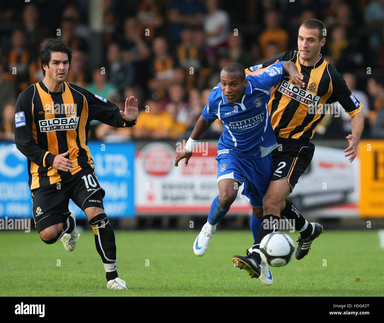 Ishmael Welsh of Grays tries to round Dan Gleeson of Cambridge as Jon ...