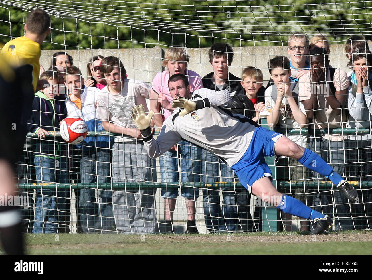 Aveley stand-in goalkeeper Glen Golby makes a match-winning penalty ...