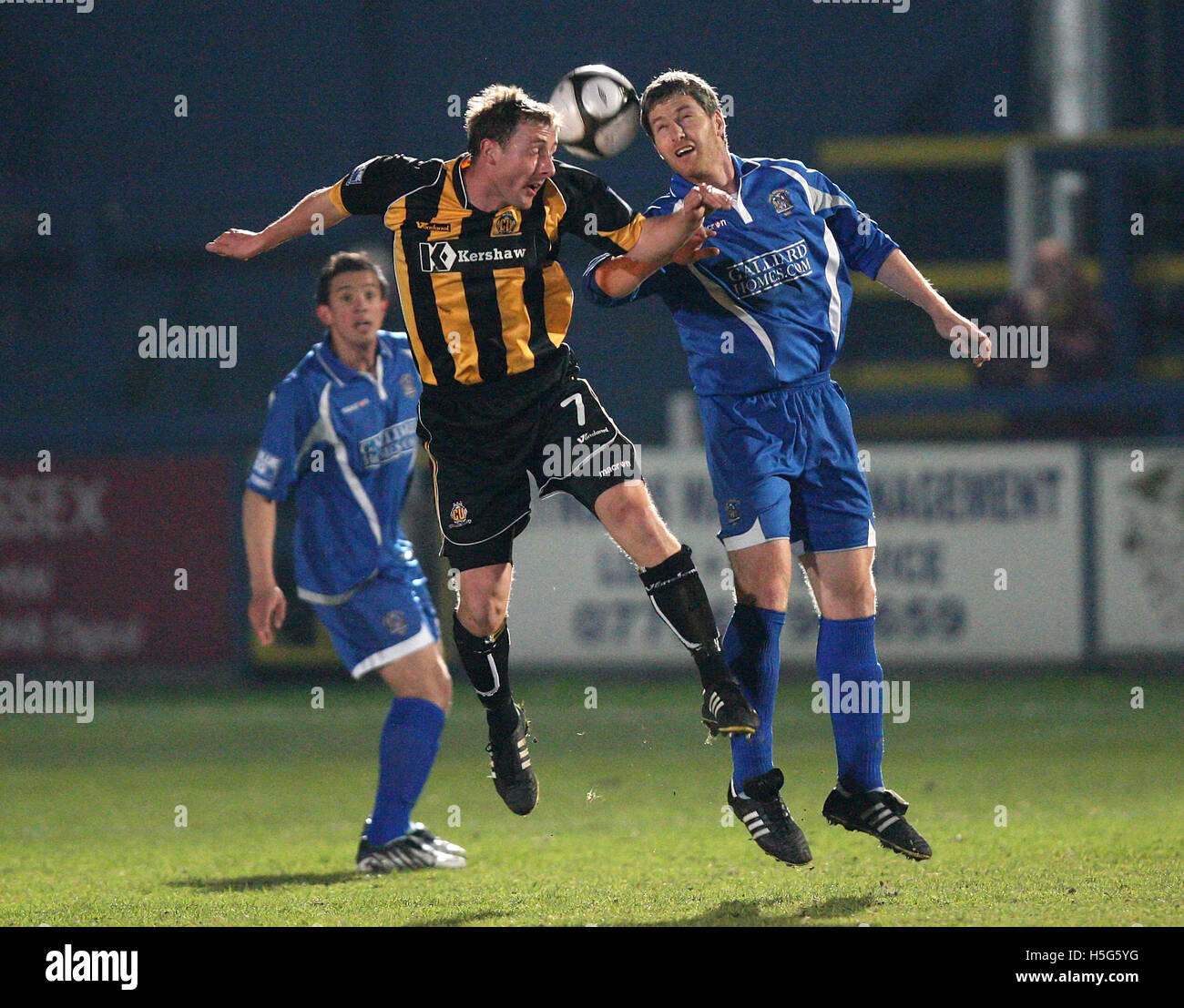 Tony Dinning of Grays rises with Mark Beesley of Cambridge - Grays ...