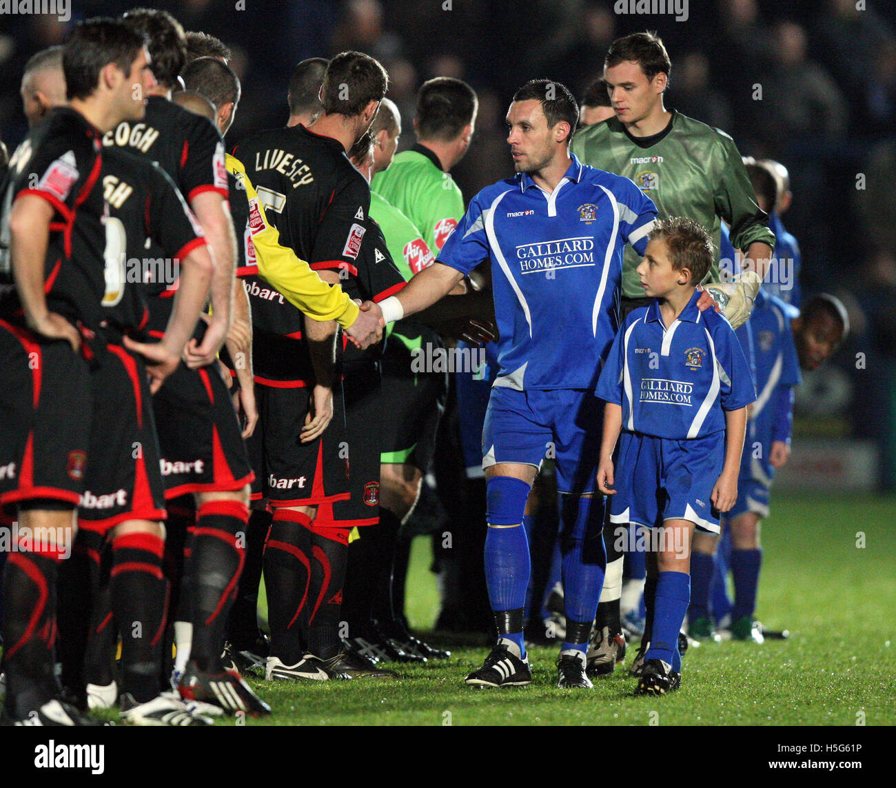 Grays captain Jamie Stuart leads the pre-match handshakes - Grays ...