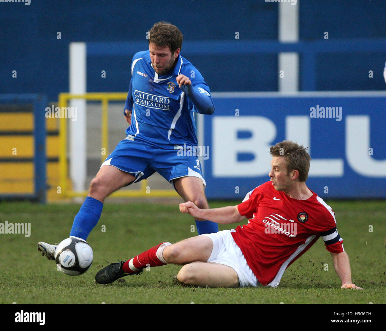 Sam Sloma of Grays is challenged by Neil Barrett of Ebbsfleet - Grays ...