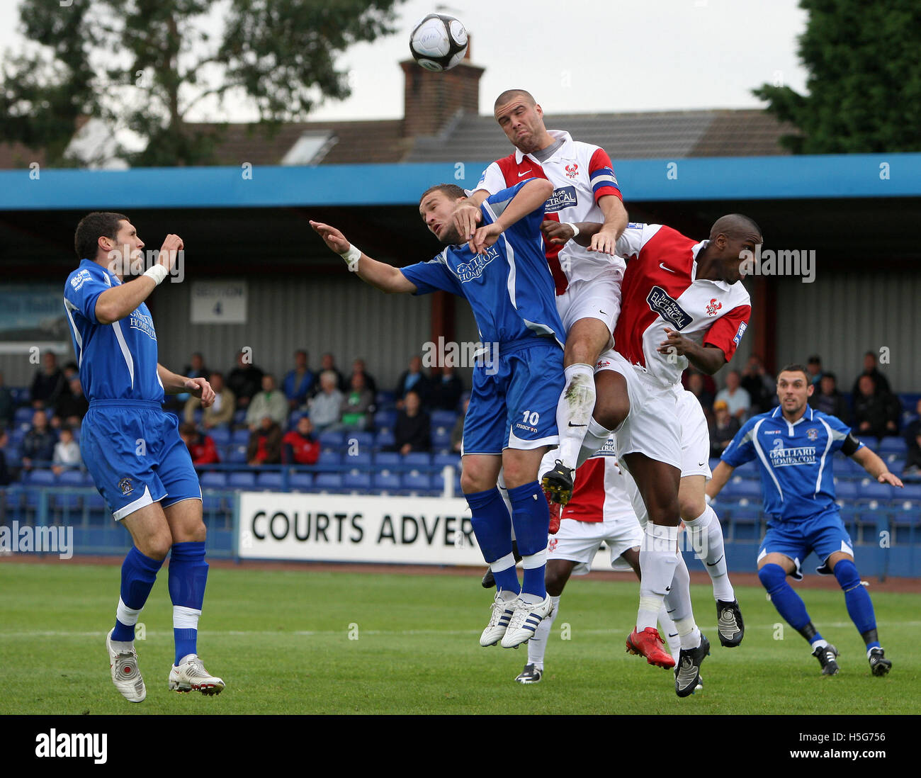Mark Creighton of Grays heads clear from Danny Kedwell - Grays Athletic ...