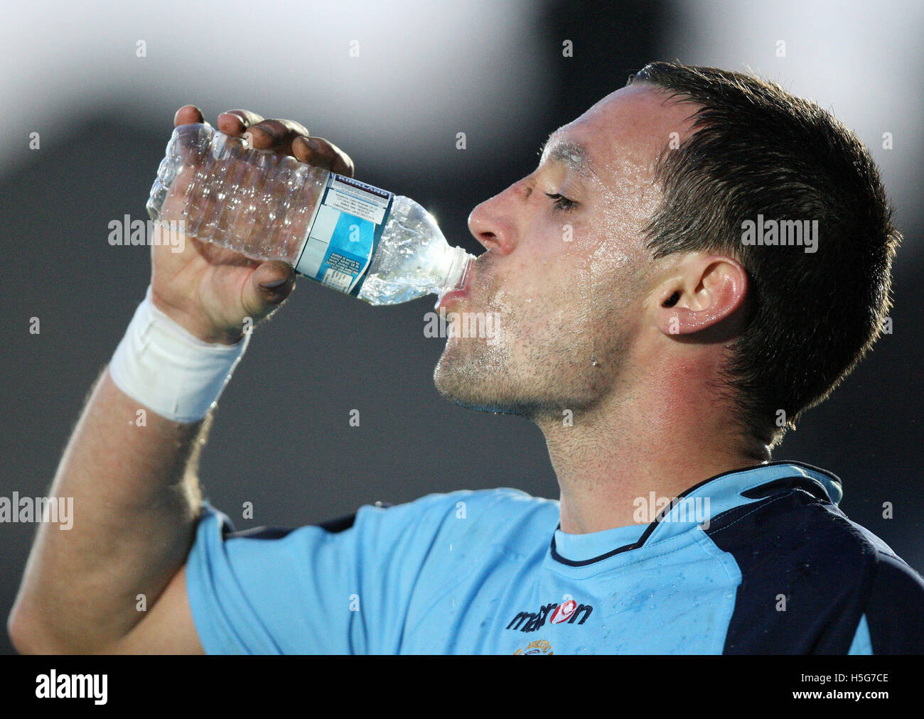 Jamie Stuart of Grays takes on water - Grays Athletic vs Rushden ...