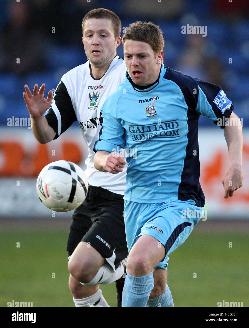 Adam Gross of Grays (right) and Wayne Turk of Salisbury in a race for ...