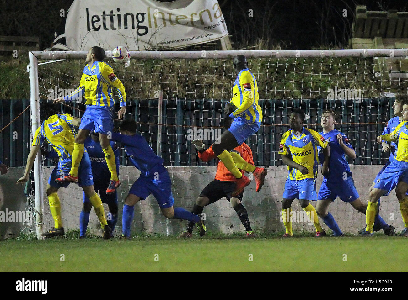 Ashley Dumas (2nd L) scores the first goal for Canvey - Redbridge vs ...
