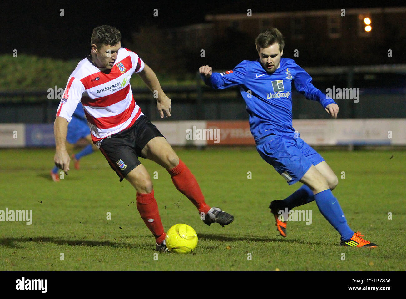 Sean Ray of Kingstonian evades Daniel Charge of Redbridge - Redbridge ...