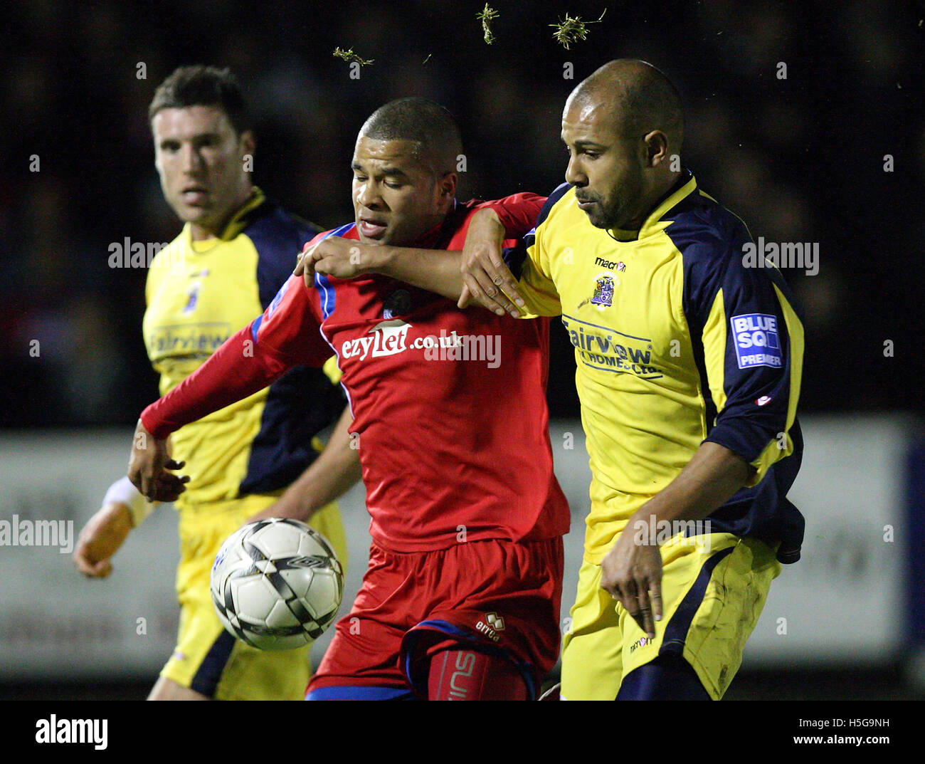 Simon Downer of Grays (right) tangles with John Grant of Aldershot ...