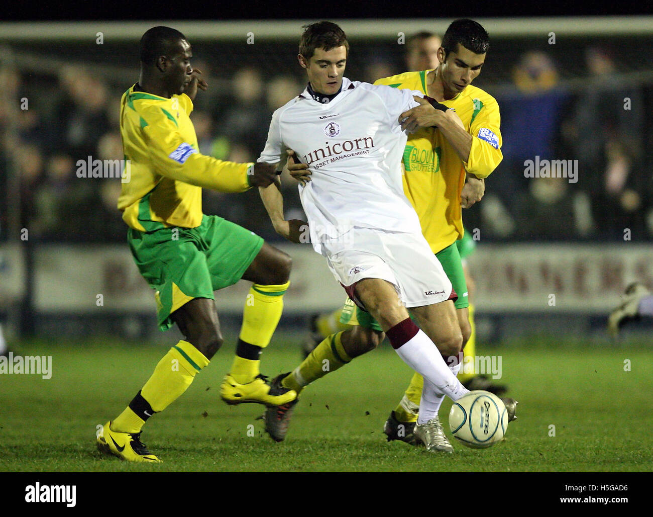 James Lawson of Chelmsford shields the ball from Phil Anderson of ...
