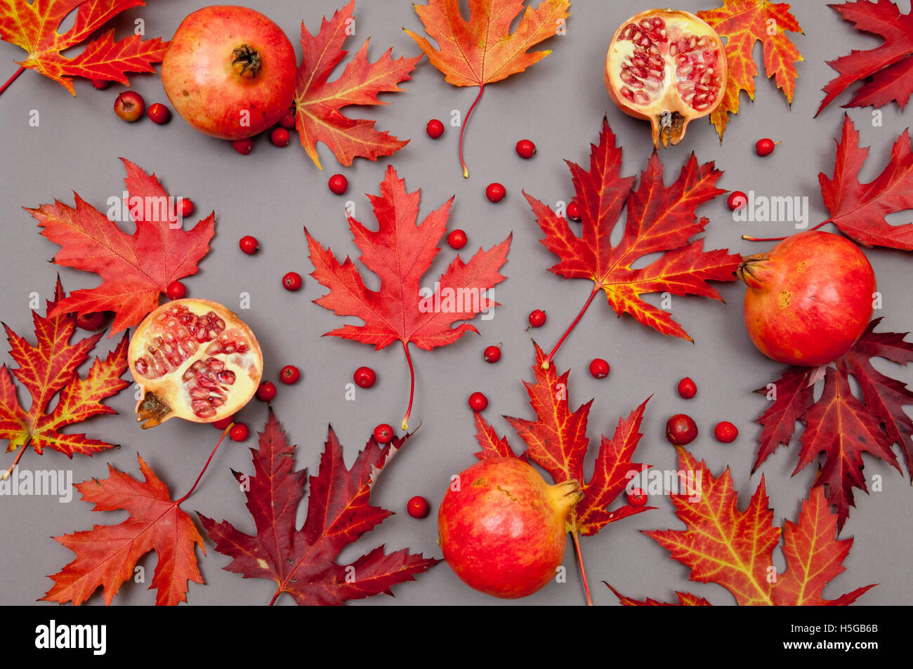 Pomegranates on gray background with copy space Stock Photo - Alamy