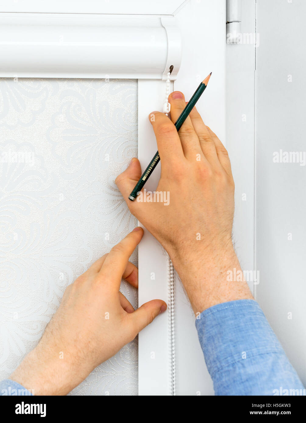 Installing window blinds hi-res stock photography and images - Alamy