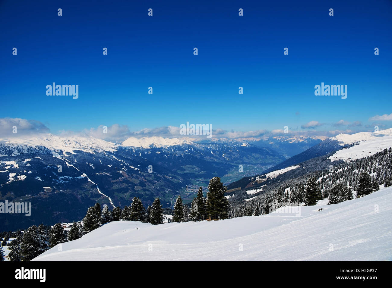 Snowy slopes in winter mountains. Skiing resorts Stock Photo - Alamy