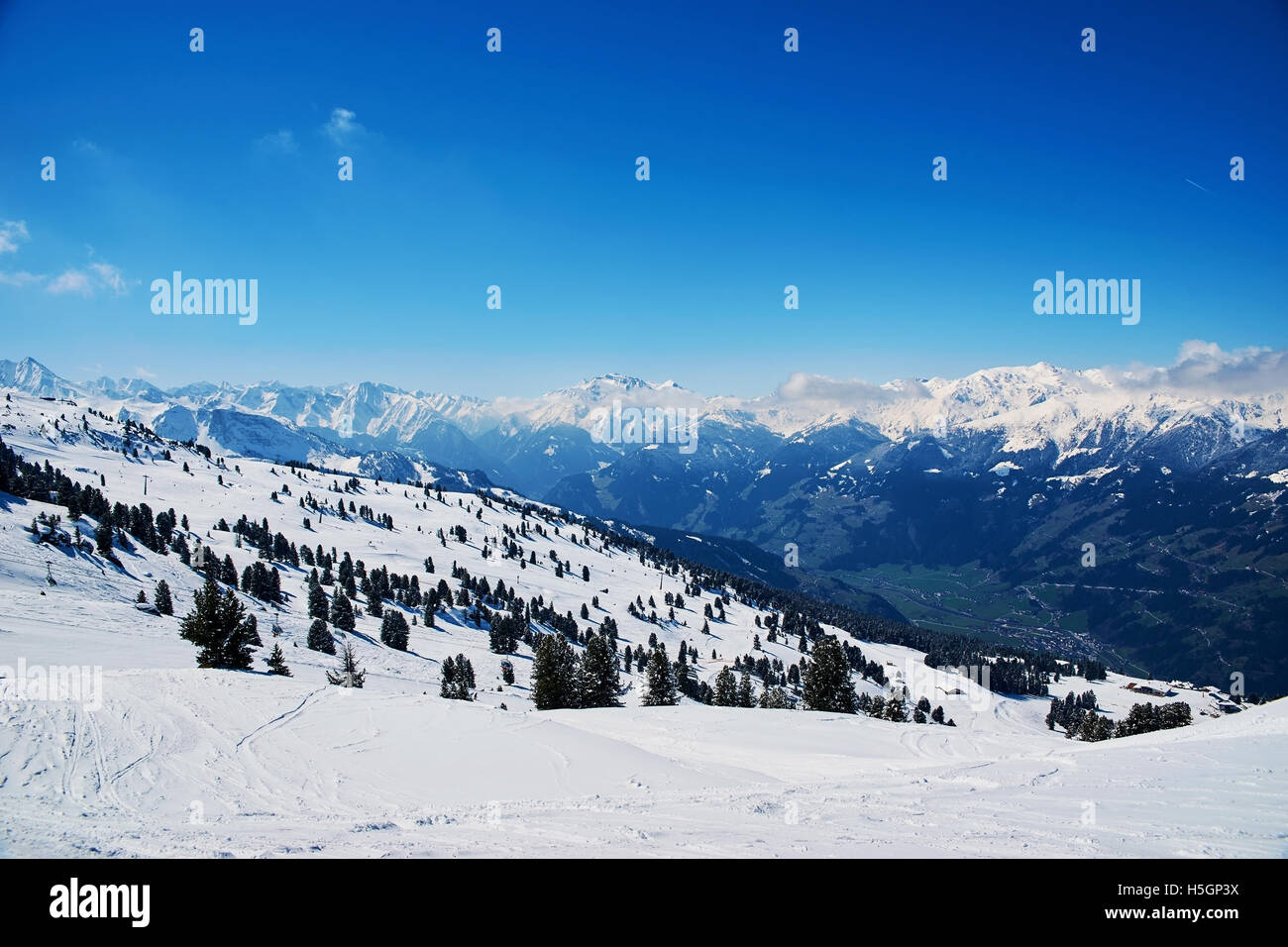 Snowy slopes in winter mountains. Skiing resorts Stock Photo - Alamy