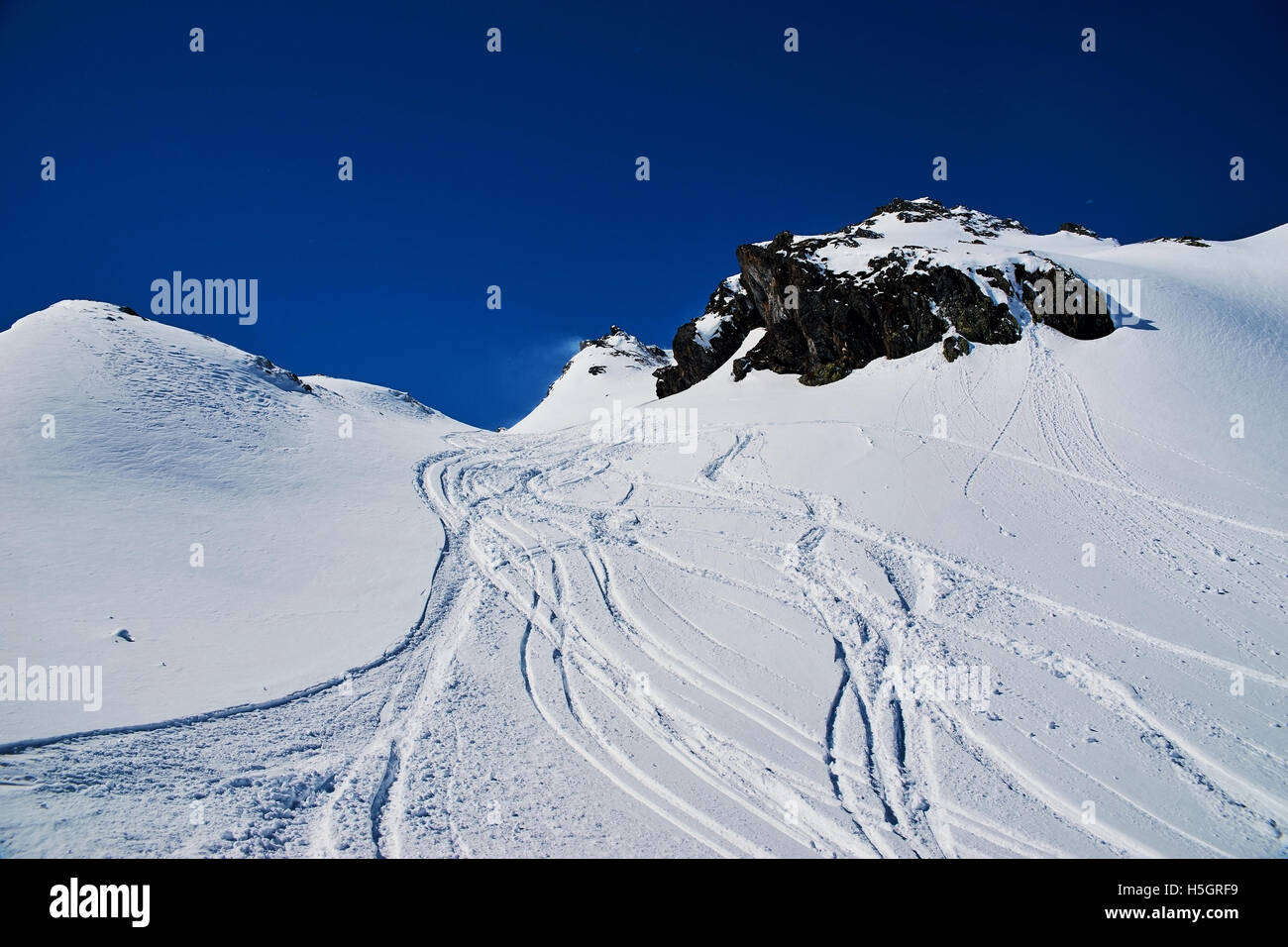 Snowy slopes in winter mountains. Skiing resorts Stock Photo - Alamy