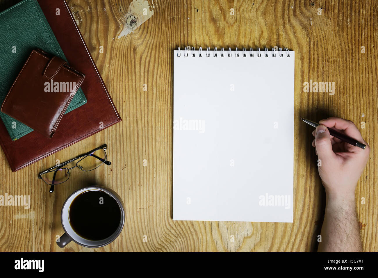 table write hand office view Stock Photo - Alamy