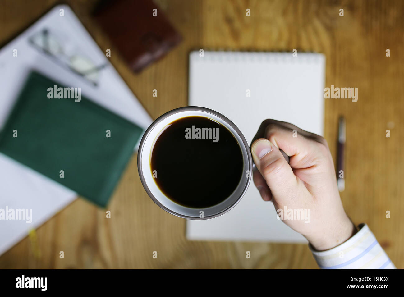 table write hand office view Stock Photo - Alamy