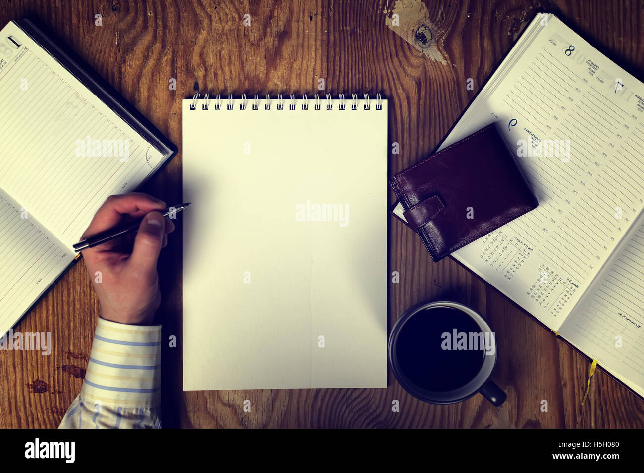 toned table write hand top view Stock Photo - Alamy