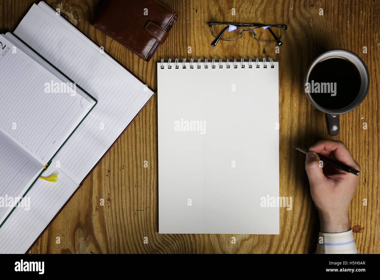 table write hand office view Stock Photo - Alamy