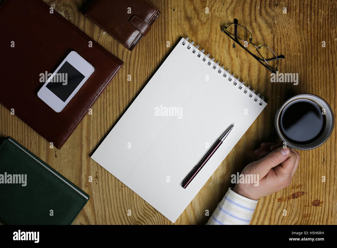 table write hand office view Stock Photo - Alamy