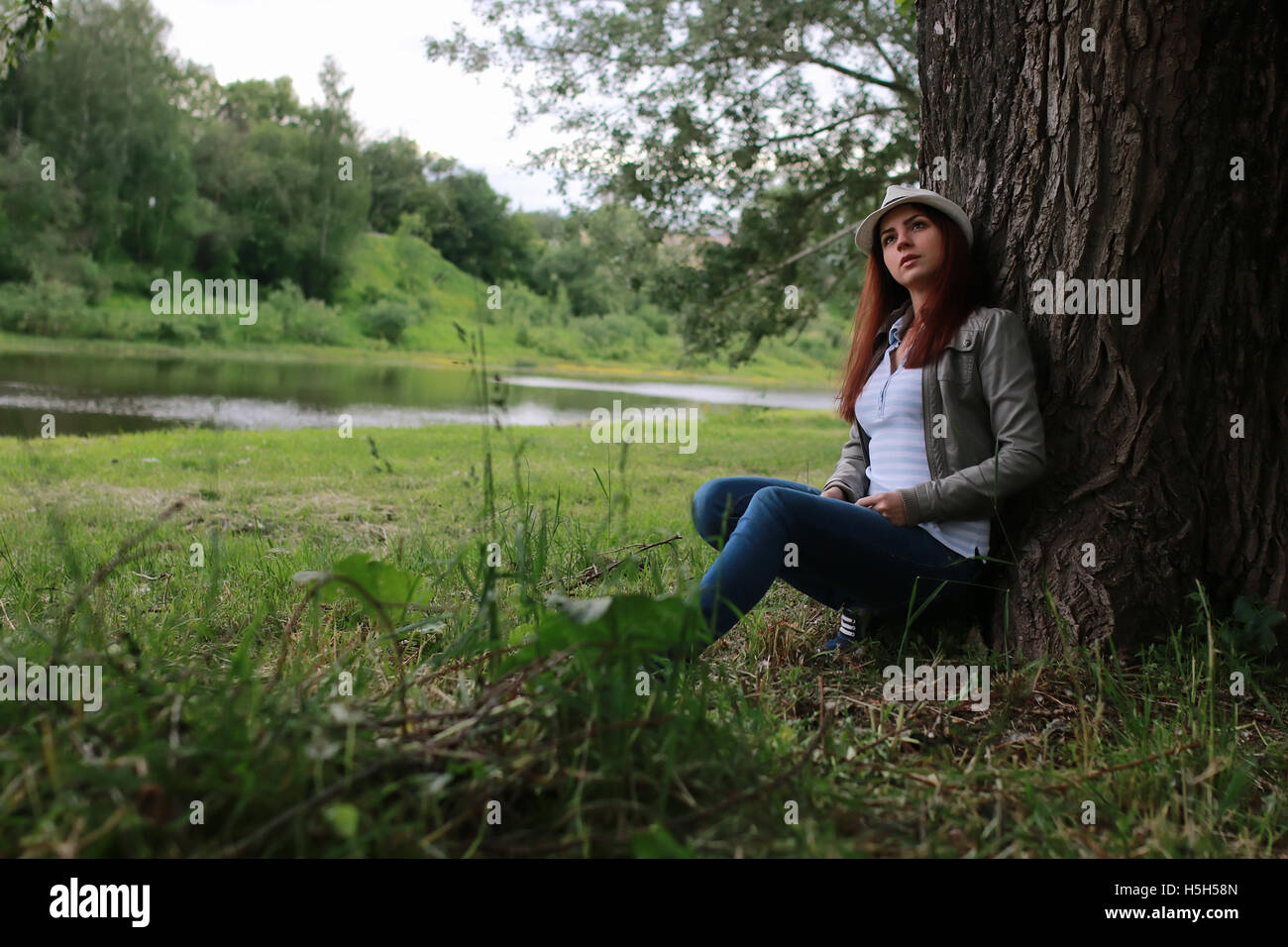 woman in tree park outdoor Stock Photo - Alamy
