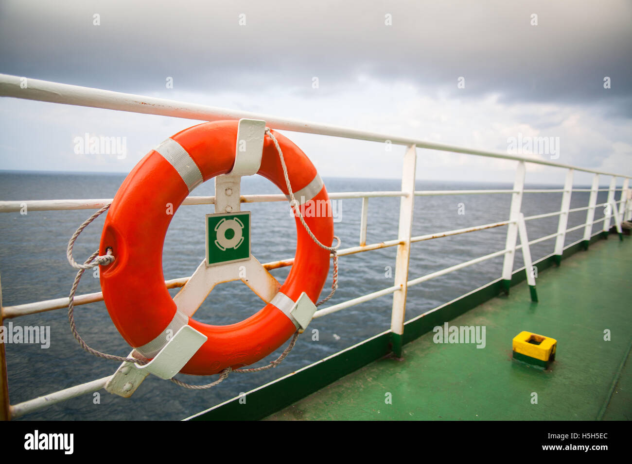 Color image lifebuoy on boat hi-res stock photography and images - Alamy