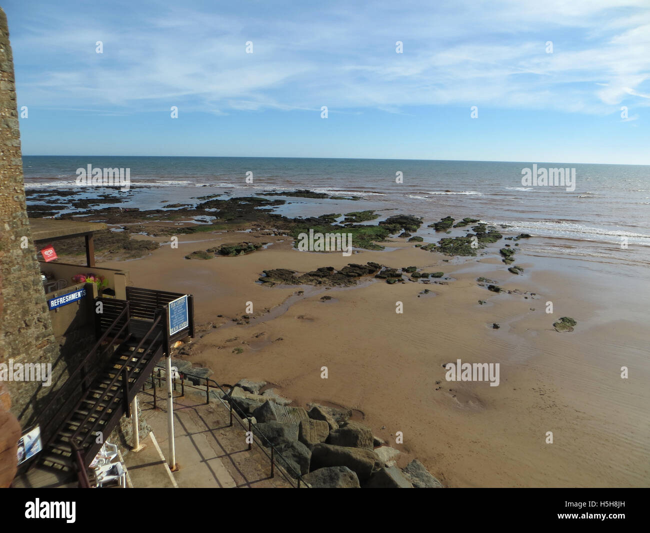 Rock pools and the edge of the café on Jacob's Ladder beach, Sidmouth ...