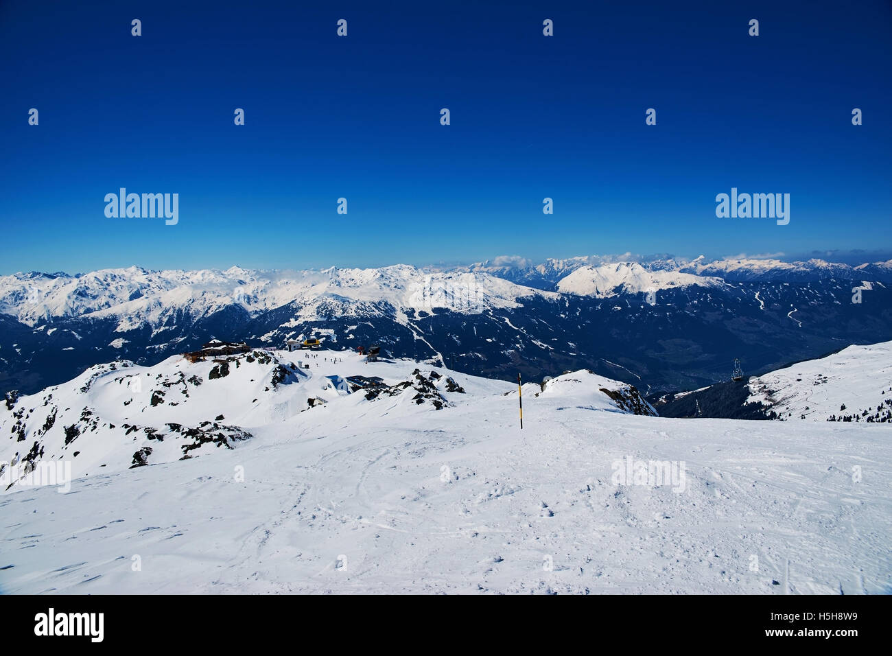 Snowy slopes in winter mountains. Skiing resorts Stock Photo - Alamy