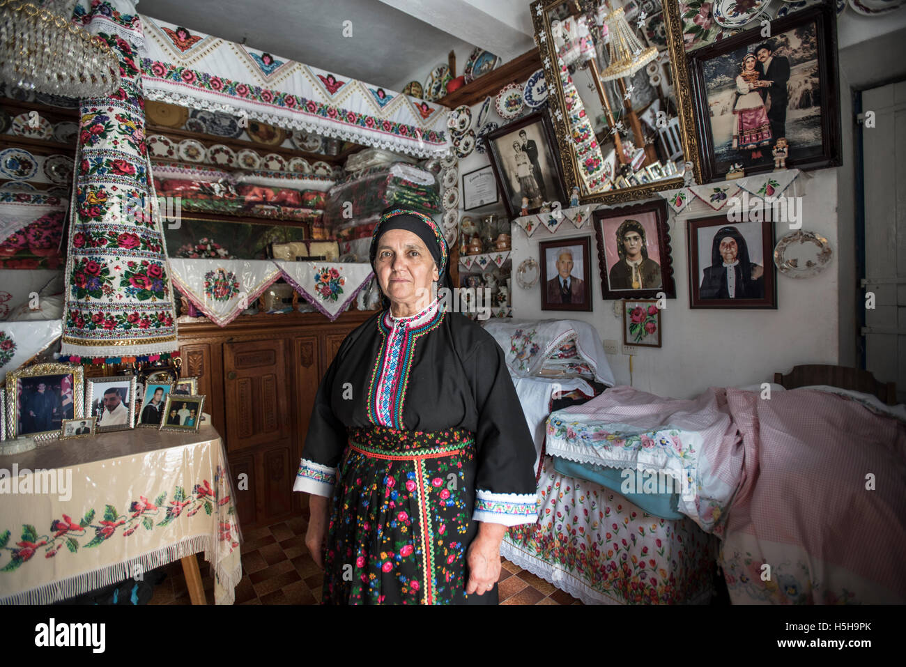 Traditional Greek house and local woman Olympos Village Karpathos ...