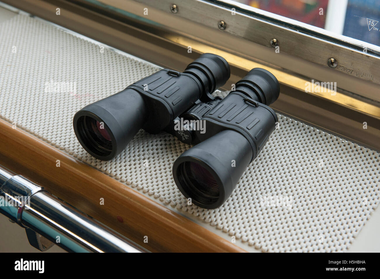 Binoculars on a ship's bridge Stock Photo - Alamy
