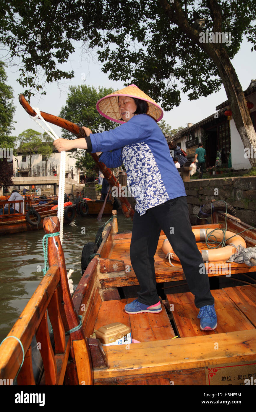Woman in hat rowing hi-res stock photography and images - Alamy