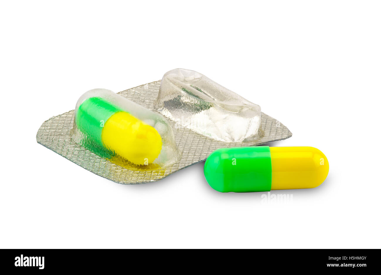 Capsule of medicine on white background Stock Photo - Alamy