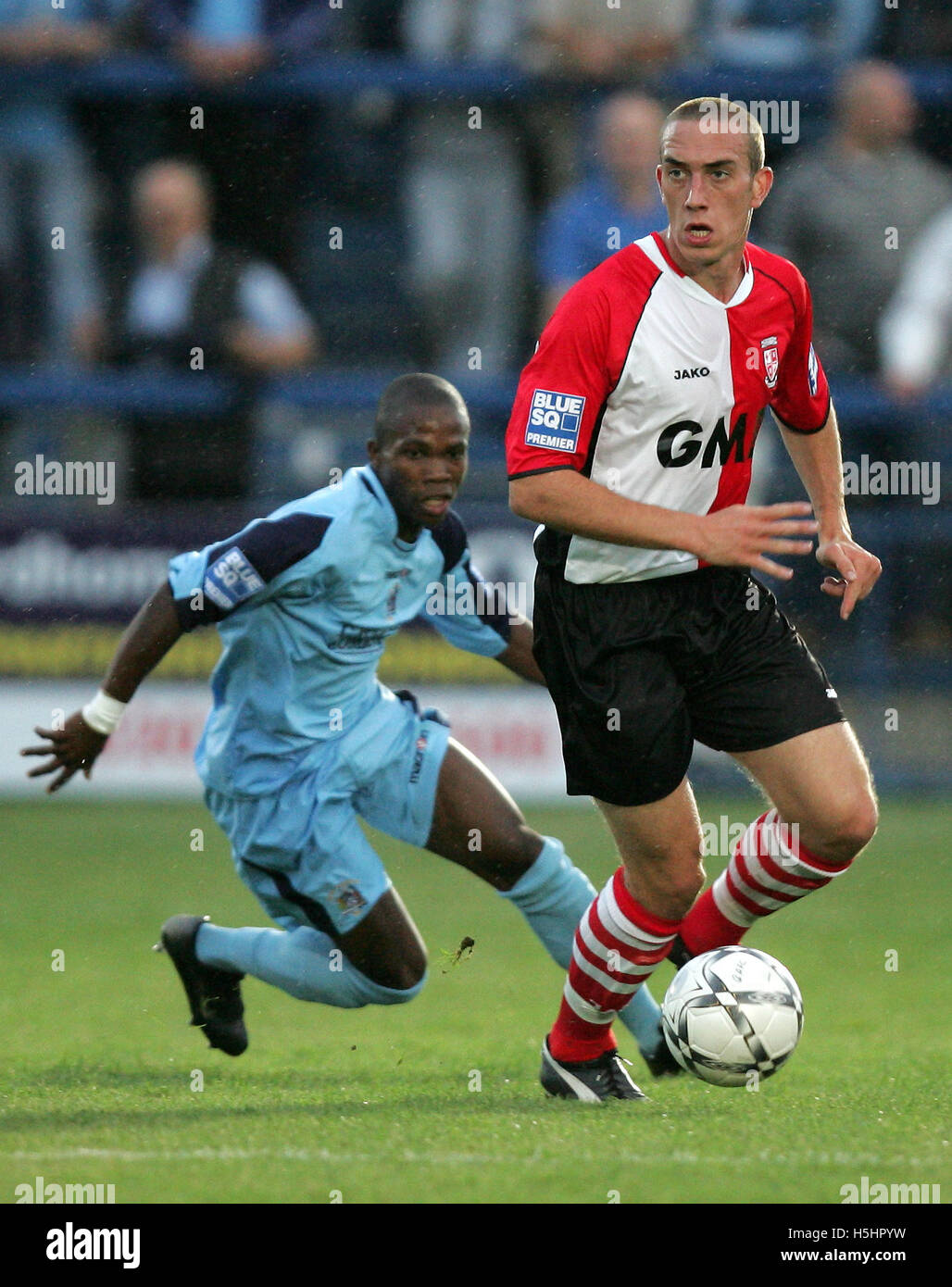 Matt Ruby of Woking evades Mark Marshall of Grays - Grays Athletic vs ...
