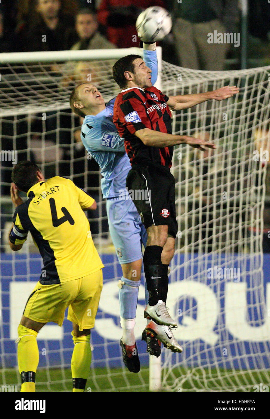 Danny Knowles of Grays punches clear from Paul Booth - Lewes vs Grays ...
