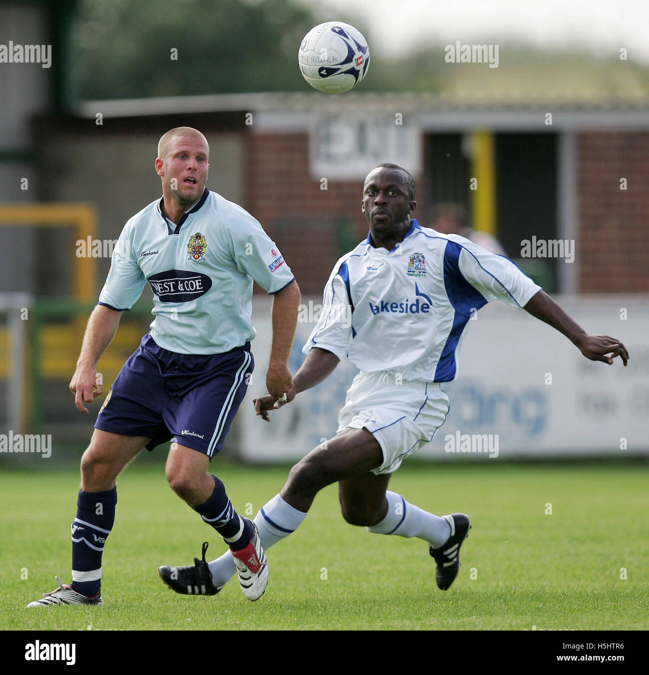 Sam Sloma of Dagenham (left) - Thurrock vs Dagenham & Redbridge ...