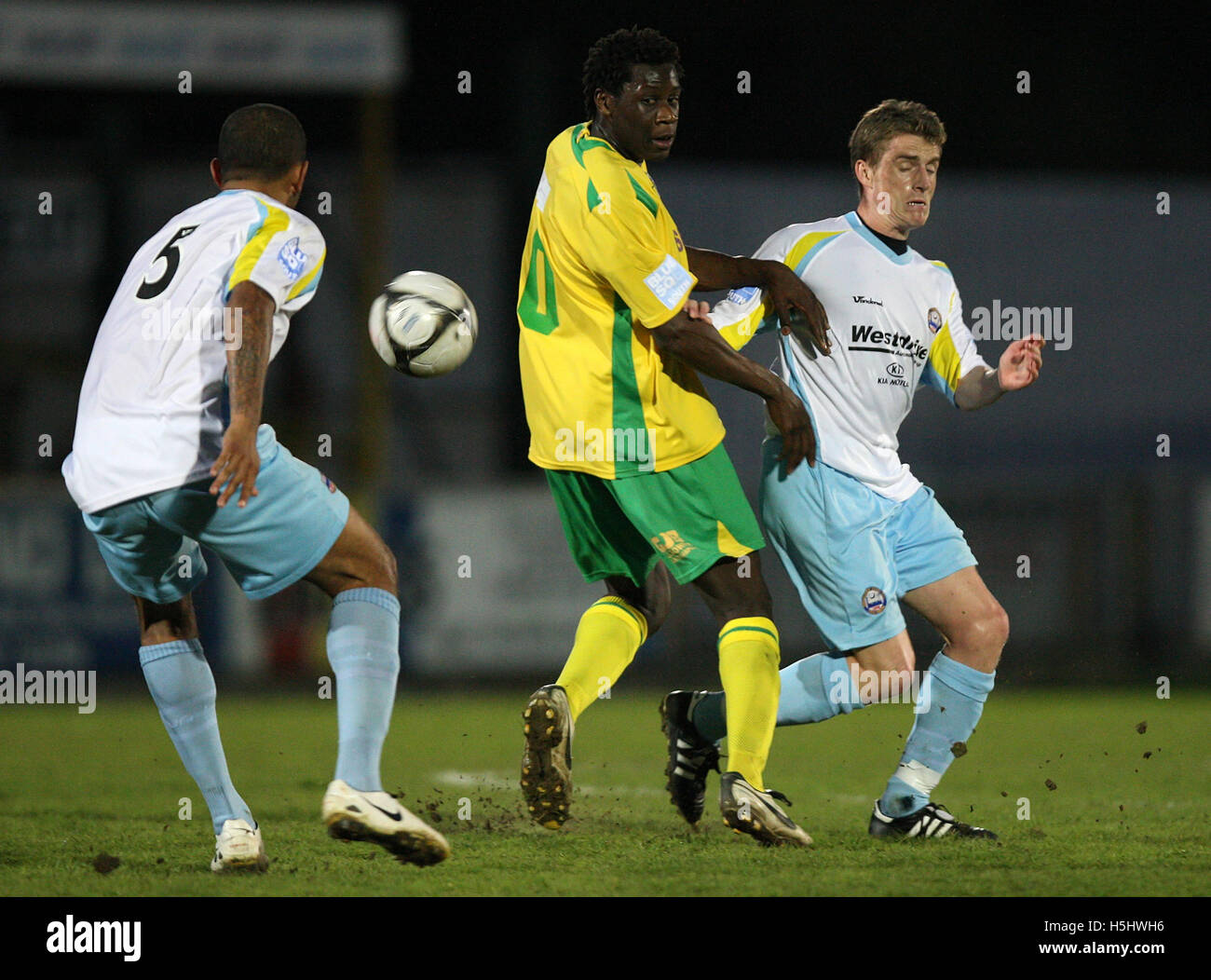 Tehokounte Malik of Thurrock is sandwiched by Joe Bruce (L) and James ...
