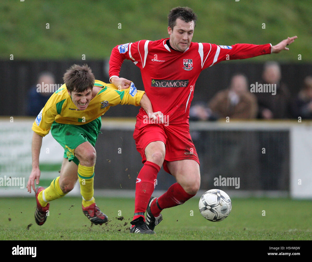 Danny Hockton of Bromley (right) holds off Greg Lincoln of Thurrock ...