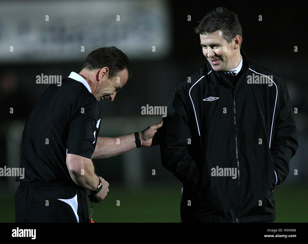 Match referee Sean Feerick shares a joke with Havant manager Shaun Gale ...