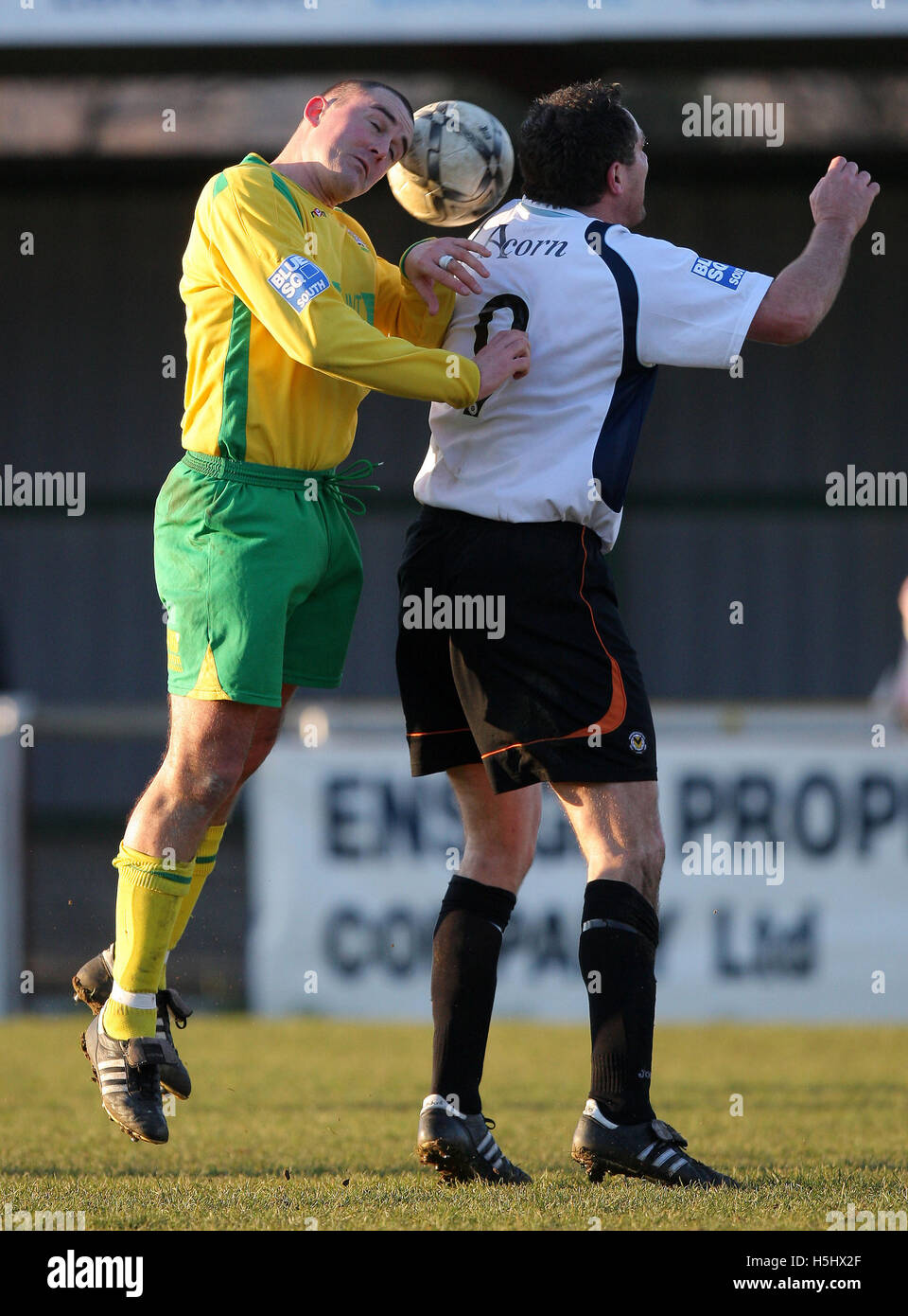 Tim Cole of Thurrock (left) tangles with Julian Alsop of Newport ...
