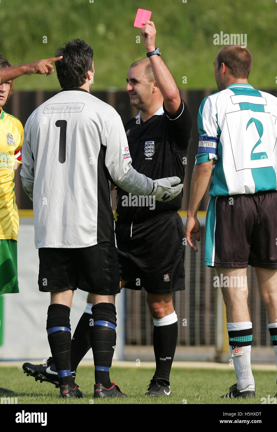 Sutton keeper Luke Naughton is dismissed by referee Paul Barnes ...