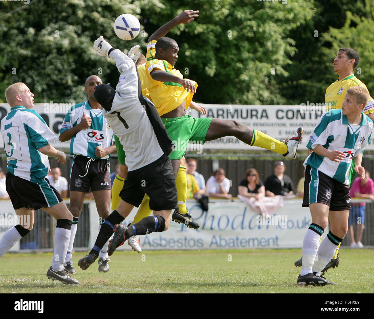 Cliff Akurang clashes with Sutton keeper Luke Naughton - Thurrock vs ...