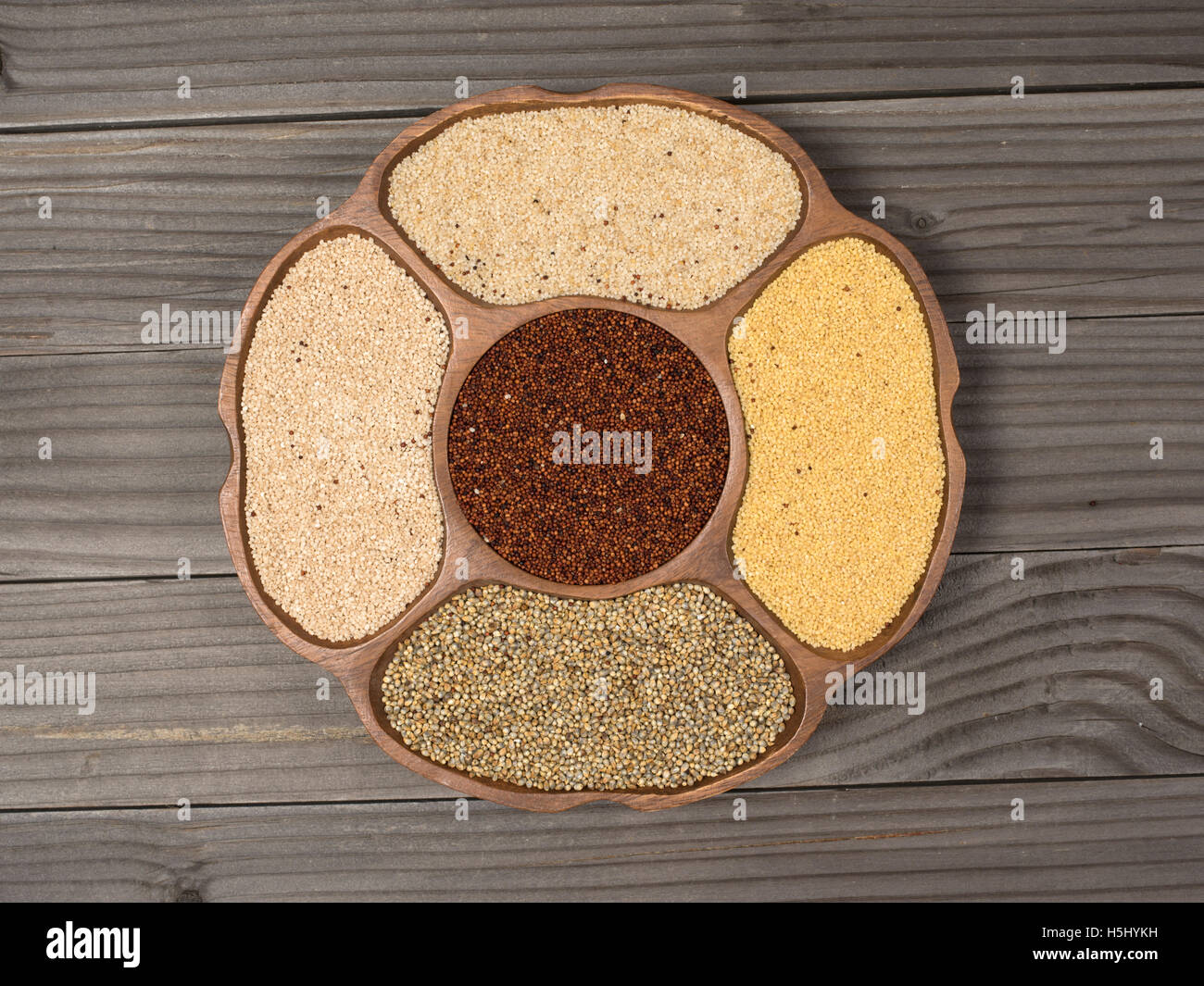 Millets - assorted millets placed in a wooden platter Stock Photo - Alamy
