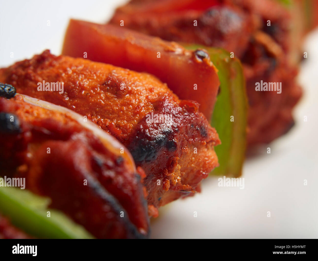 Chicken Tikka - grilled boneless chicken pieces with tomato and ...