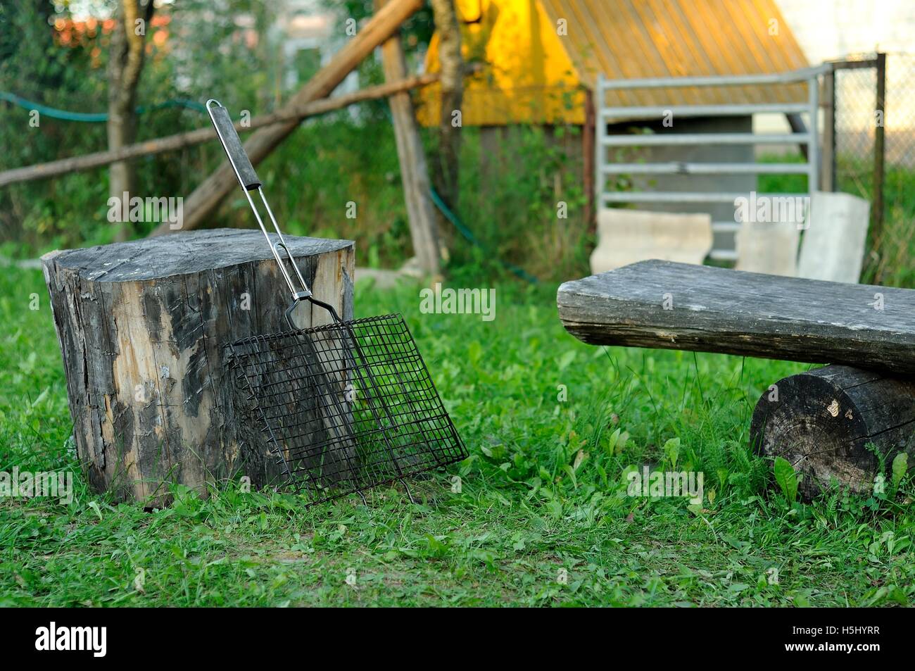 old lattice for a grill rests on the stump Stock Photo - Alamy