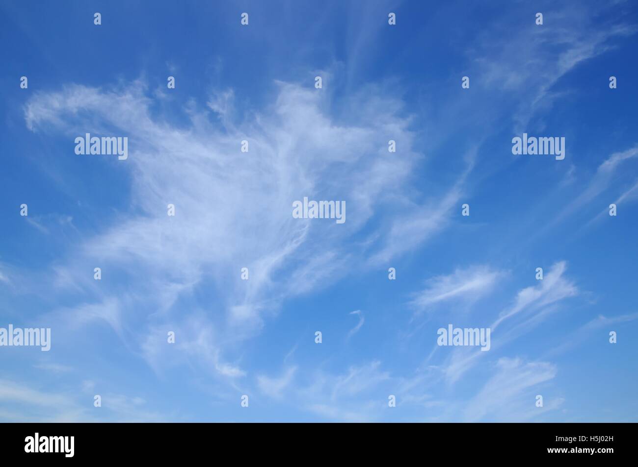 beautiful blue sky with spindrift clouds Stock Photo - Alamy