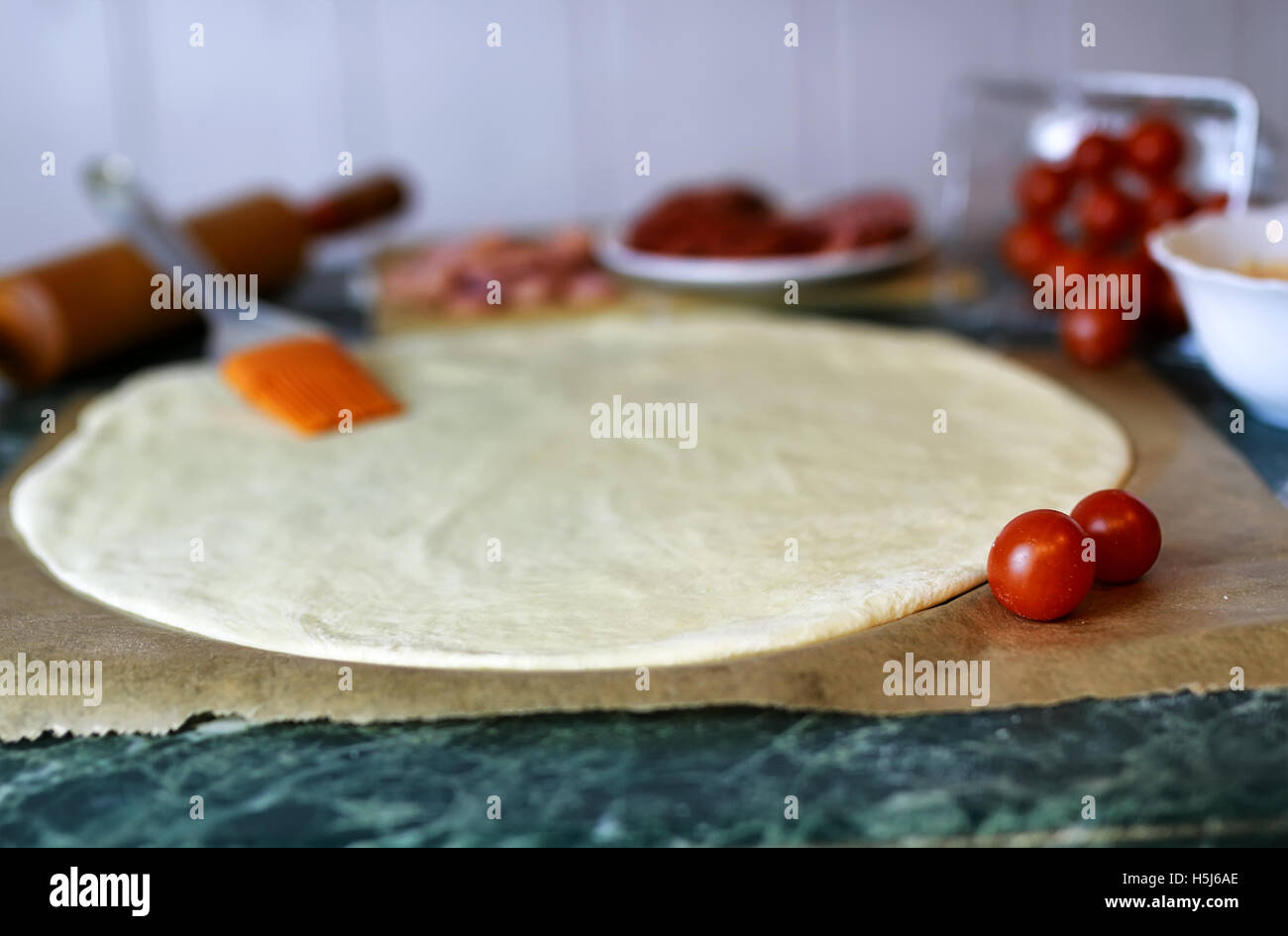 prepare pizza topping Stock Photo - Alamy