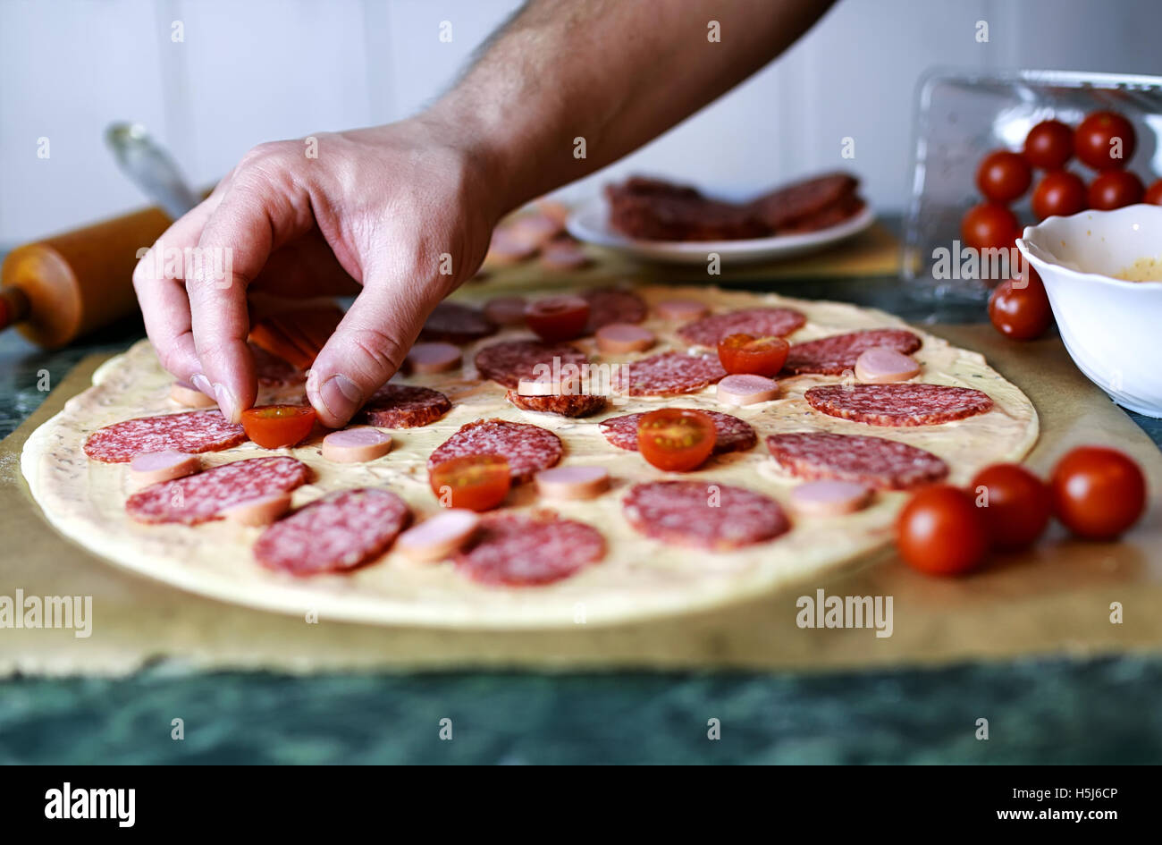 prepare pizza topping Stock Photo - Alamy