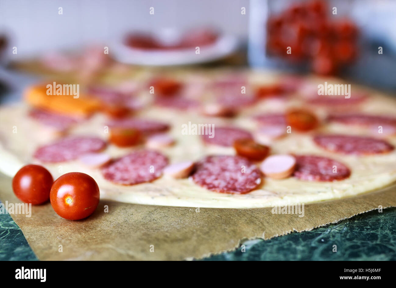 prepare pizza topping Stock Photo - Alamy