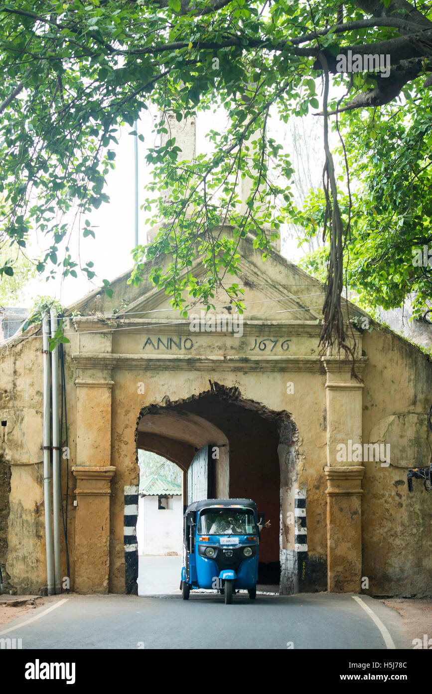 Tuk-tuk driving through the entrance of Fort Frederick, Trincomalee ...