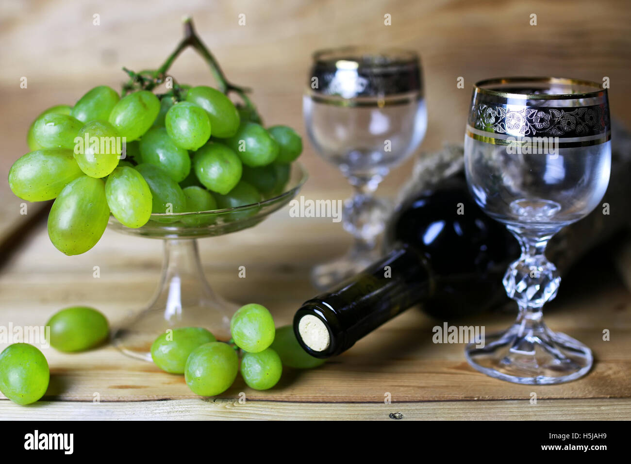 wine bottle book and glass grape Stock Photo - Alamy