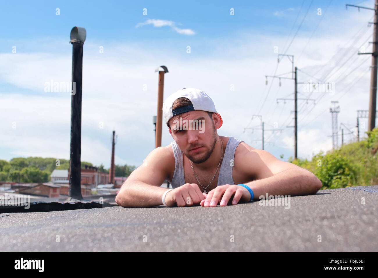 bearded man under bridge urban Stock Photo - Alamy